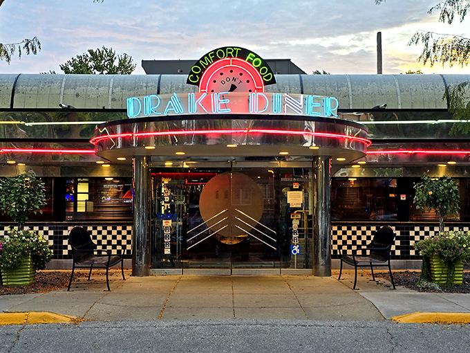 The neon glow of Drake Diner beckons like a lighthouse for the hungry soul. Comfort food never looked so inviting against the twilight sky.