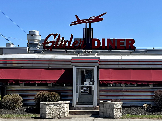 The iconic red Glider Diner sign soars above Scranton like a beacon of comfort food hope. Classic Americana at its finest.