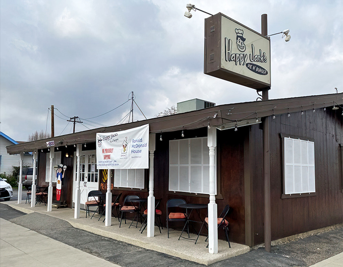 The humble facade of Happy Jack's beckons with its white-trimmed doors and string lights, promising comfort food treasures that Instagram influencers haven't yet ruined.