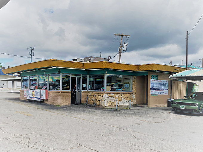 The time machine disguised as a drive-in hasn't changed its yellow and green uniform since the Beatles were topping charts. Pure Dallas nostalgia.