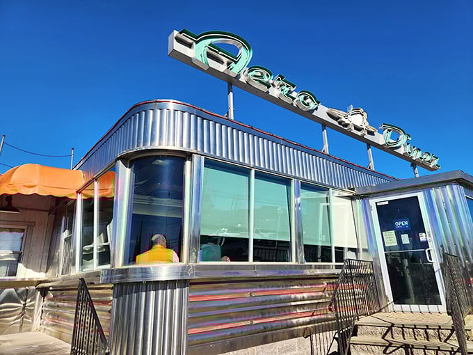 From this angle, the Aero Diner's aeronautical-inspired signage hovers above its stainless steel frame like a promise of culinary flight&mdash;no boarding pass required.