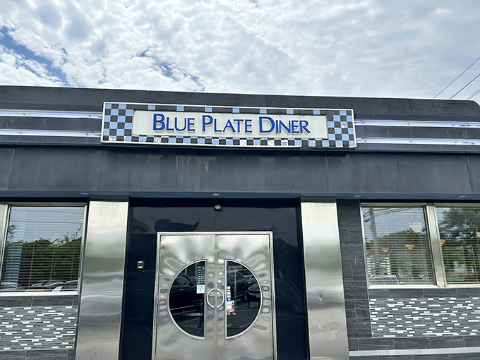 The unassuming exterior of Blue Plate Diner hides culinary treasures within, like finding a Michelin star behind a gas station.