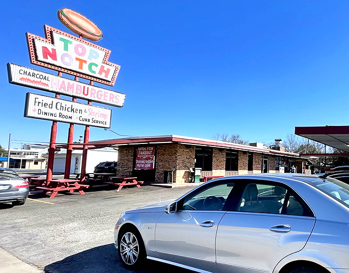That iconic neon sign isn't just advertising&mdash;it's a time machine to when burgers were grilled over real charcoal and carhops still existed.