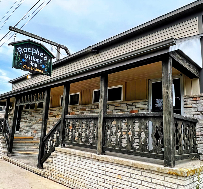 The weathered sign hanging outside Roepke's Village Inn promises what lies within—authentic Wisconsin supper club magic that time forgot.