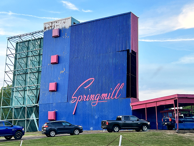 That iconic blue facade with "Springmill" in neon script isn't just a movie screen—it's a time machine disguised as architecture.