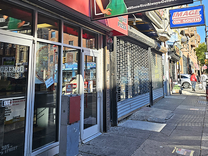 South Street's pizza landmark stands ready for another day of feeding the hungry masses their cheese-only slices.