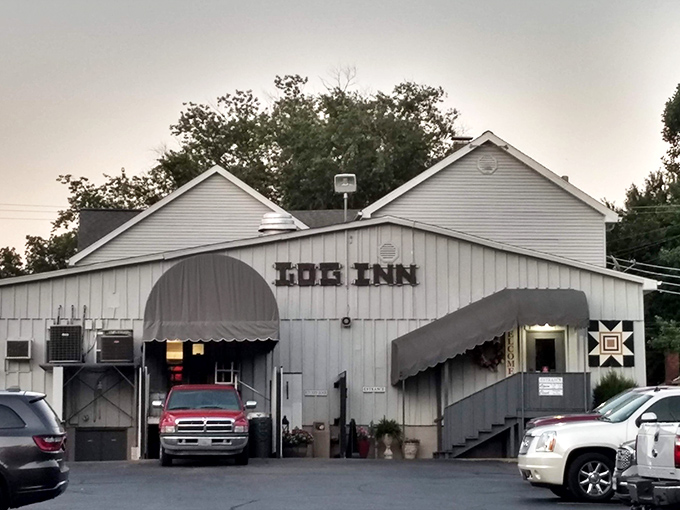 A full parking lot is the universal sign for "something delicious happens here." The Log Inn's modest facade doesn't need to shout about its legendary status.