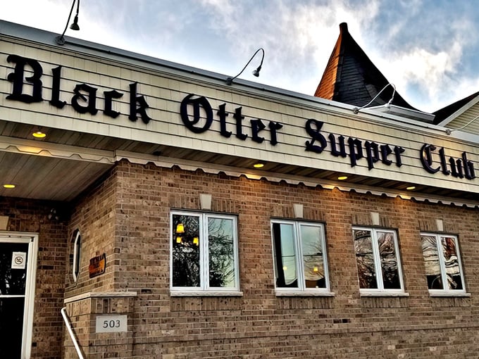 The classic brick exterior of Black Otter Supper Club stands as a beacon of Wisconsin culinary tradition, promising carnivorous delights within those unassuming walls.