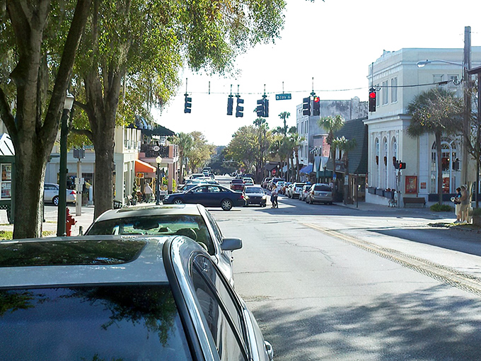 Downtown Mount Dora invites you to stroll beneath Spanish moss-draped trees, where historic storefronts and unhurried locals create Florida's answer to Stars Hollow.