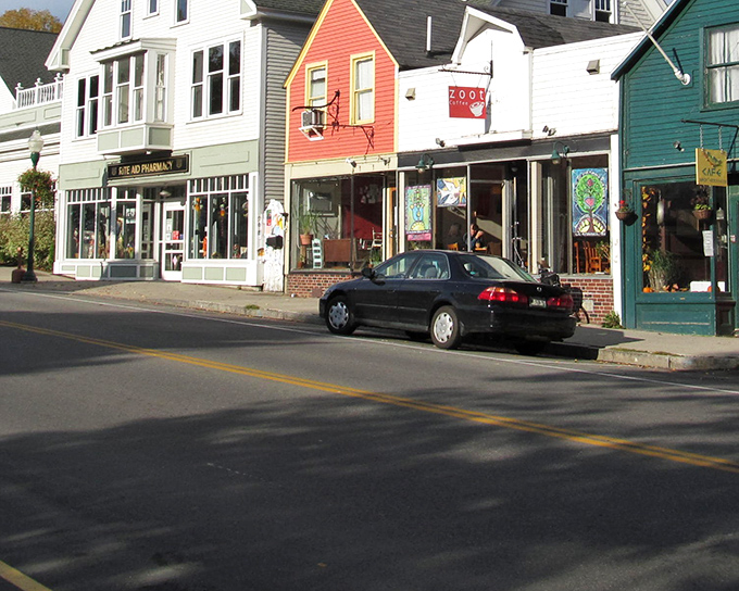 Colorful storefronts line Camden's main drag, where the bright orange building stands out like a lobster at a clam bake.