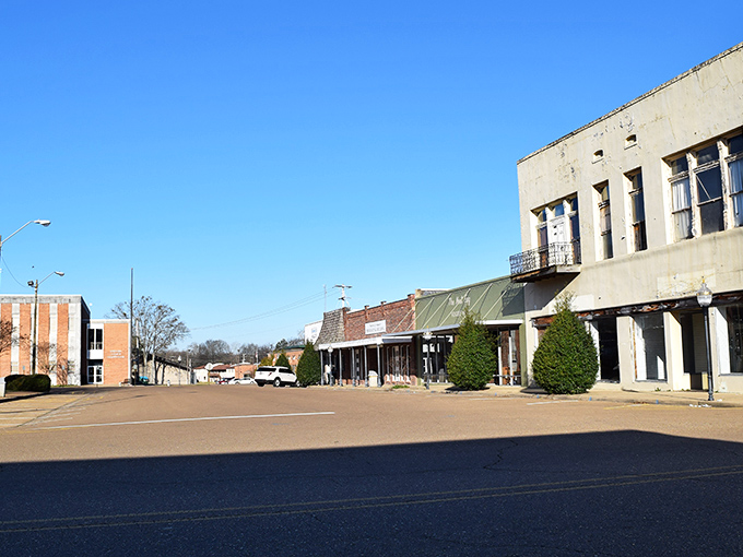 Historic storefronts stand sentinel around Grenada's town square, their brick facades telling stories of generations past while housing today's local businesses.