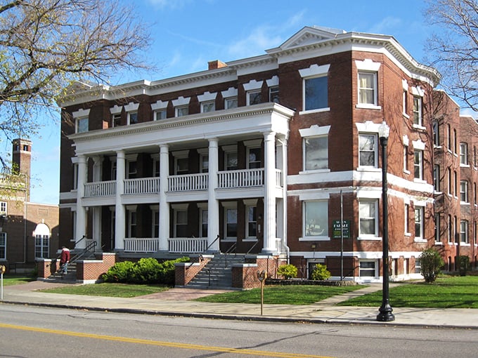 This stately brick building with grand white columns whispers tales of Dunkirk's prosperous past while offering modern-day charm at yesterday's prices.