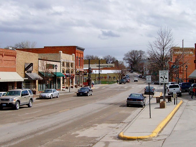 Main Street Buffalo &ndash; where traffic jams mean waiting for two pickups to pass. Small town charm with big mountain views.
