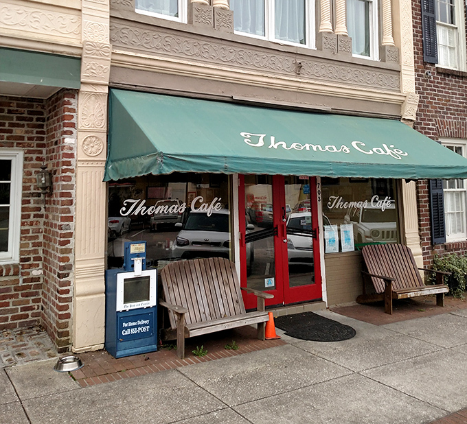 The iconic teal awning of Thomas Cafe has welcomed hungry Georgetown visitors for generations, a beacon of Southern comfort on Front Street.