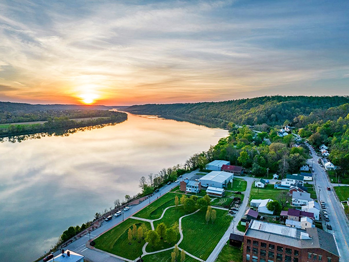 The open road beckons with autumn's golden touch along the Ohio River Scenic Byway, where every curve promises a new discovery.