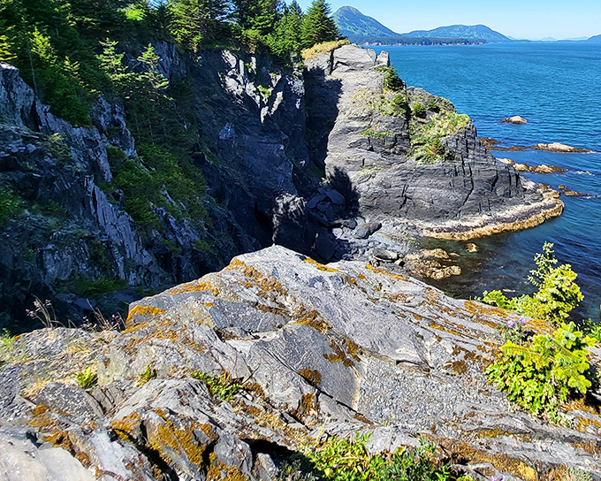 Nature's takeover artist: Rugged cliffs and azure waters create a dramatic backdrop that makes even professional photographers question their filter settings.