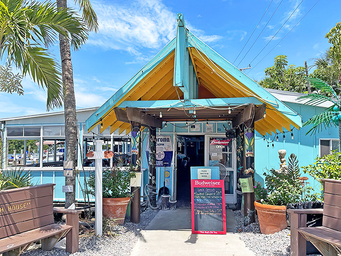 The turquoise beacon of seafood salvation! Casey Key Fish House's entrance promises Florida dining without pretense&mdash;just add appetite and a willingness to slow down.