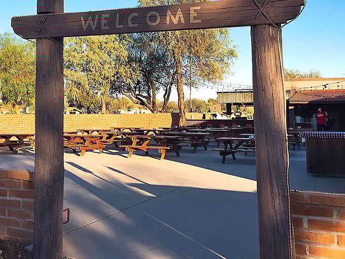 A wooden "WELCOME" arch invites you into a world of picnic tables and desert dining&mdash;Arizona's version of a backyard barbecue paradise.