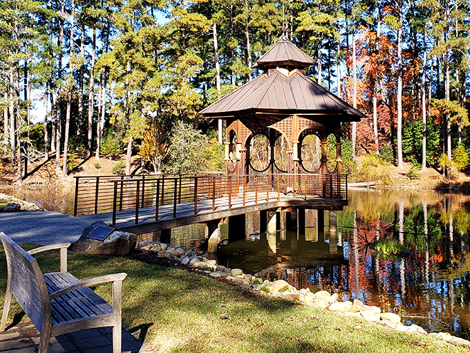 Morning light filters through the trees, casting golden reflections on the pond while the gazebo stands ready for contemplative moments or impromptu poetry sessions.