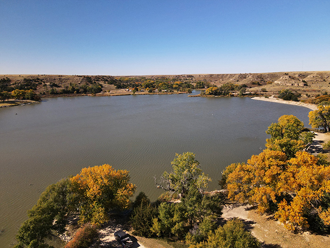 Autumn's golden touch transforms Lake Scott into nature's own masterpiece &ndash; better than any screensaver you've ever downloaded.