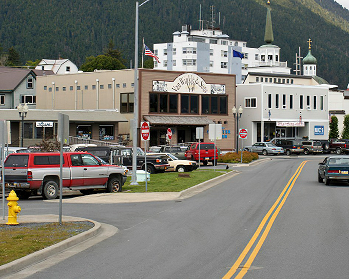 Downtown Sitka's historic charm unfolds beneath the watchful gaze of St. Michael's Cathedral, where Russian history meets small-town Alaskan life.