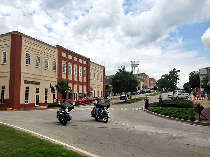 Senoia's Main Street looks like it was designed by someone who got an A+ in "Perfect Small Town 101." That iconic water tower keeps watch over everything.