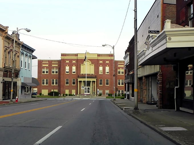 Downtown Elizabethtown's historic courthouse stands like a brick sentinel, watching over streets where neighbors still wave from their cars.