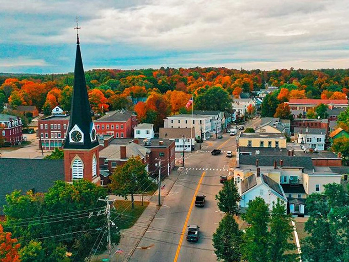 Autumn in Farmington isn't just a season, it's a masterpiece. That church steeple standing sentinel over a town where retirement dollars stretch like the endless horizon.