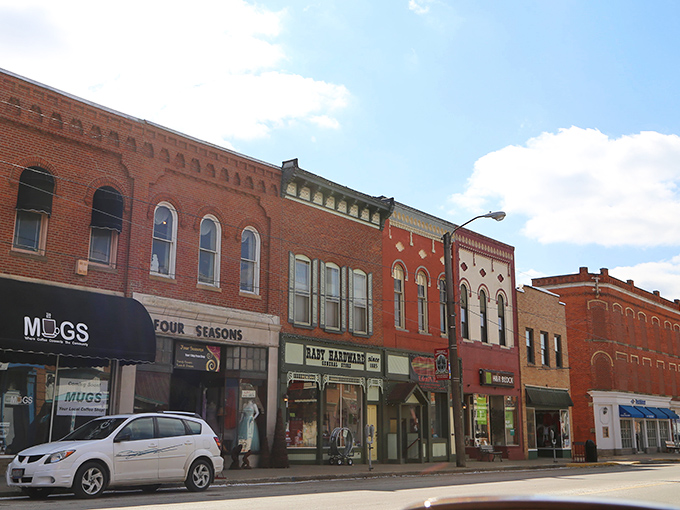 Brick-lined storefronts stand shoulder to shoulder like old friends, each with stories to tell and treasures to discover inside.