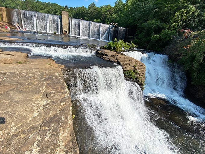 Nature's own infinity pool! DeSoto Falls cascades dramatically over ancient rock formations, creating a symphony of rushing water that soothes the soul.