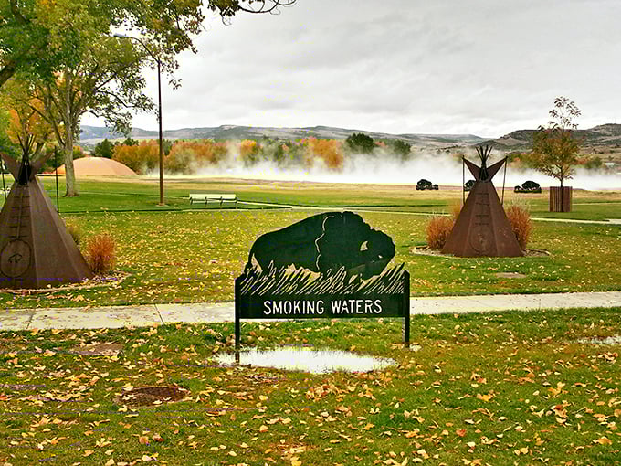 Mother Nature's welcome sign: steam rising from mineral-rich waters while teepees stand guard. Wyoming's version of a spa day begins here.
