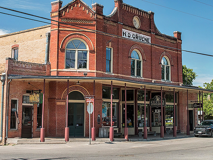 That H.D. Gruene building stands like Texas royalty, brick and mortar proof that some things just get better with age.