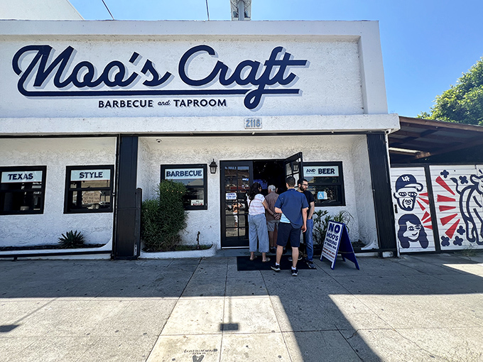 The unassuming white exterior of Moo's Craft Barbecue hides culinary treasures within, like a poker player with four aces saying "I'll just check."