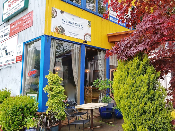 The cheerful yellow exterior with bright blue trim makes Cafe Du Berry impossible to miss, like a breakfast beacon calling you home on a Portland morning.