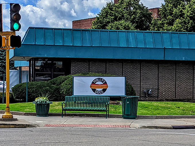 The turquoise crown jewel of Clinton's food scene stands proudly on the corner, beckoning hungry travelers with its retro charm and promise of Chicago-style delights.