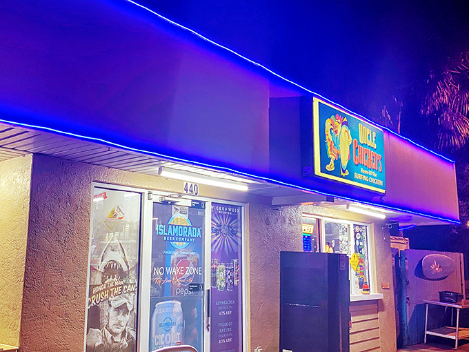 Uncle Chicken's neon-lit exterior glows like a beacon for hungry souls. At night, this New Smyrna Beach treasure transforms into a fluorescent promise of culinary delight.