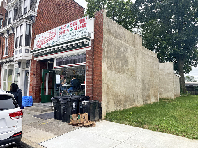 The unassuming brick facade of The Jackson House hides culinary greatness within, like finding Shakespeare performing in a high school auditorium.