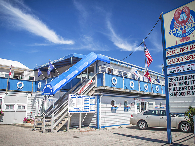 The blue-trimmed facade of Champlin's stands like a beacon of seafood salvation against the Rhode Island sky. No architect would call it fancy, but your taste buds will call it paradise.