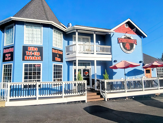 The welcoming front porch at Smokehouse 41 isn't just for show&mdash;it's where barbecue dreams come true and diet plans go to die, gloriously.