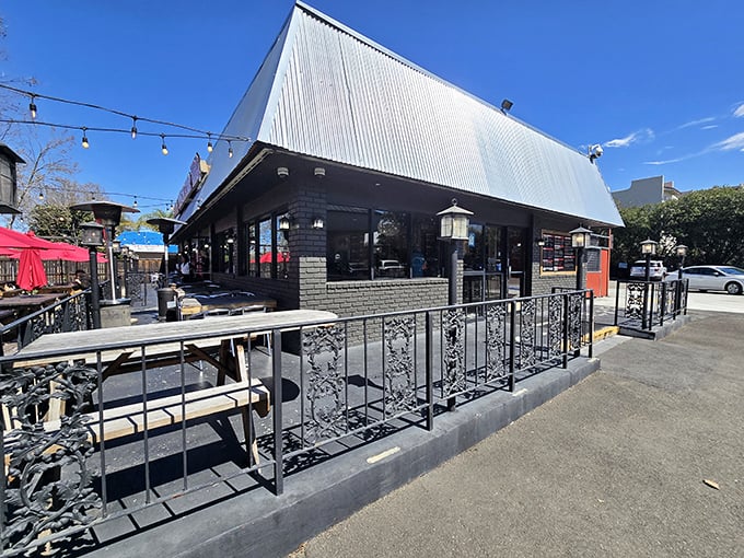 The A-frame sanctuary of smoke and salvation stands proudly on South Winchester Boulevard, beckoning hungry pilgrims with its distinctive silhouette and promise of barbecue bliss.