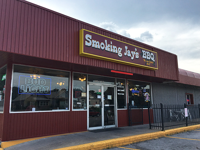 The bright red exterior of Smoking Jay's BBQ stands like a beacon of hope for hungry travelers. Their motto "We Love Smokin' MEAT" isn't just signage—it's a solemn promise.