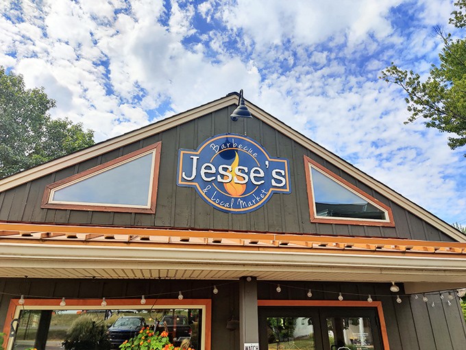 The blue sky seems to celebrate Jesse's Barbecue as much as the locals do. This charming fa&ccedil;ade promises smoky treasures within.