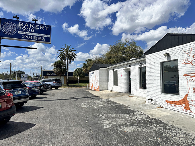 Don't judge a dumpling by its cover! This unassuming white brick building with its simple blue sign hides flavor explosions waiting to happen.