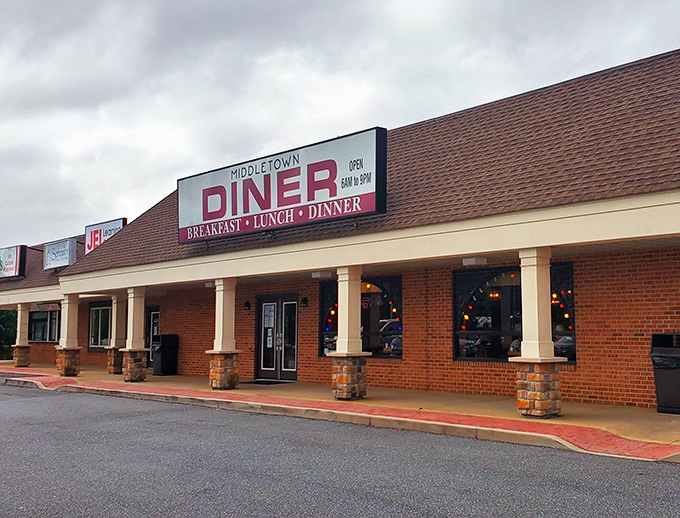Where breakfast dreams come true! The classic red signage promises exactly what you'll get &ndash; honest food that doesn't need fancy marketing to shine.