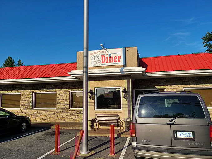 Classic diner architecture meets modern comfort, where red roofs signal good times and even better meals ahead.