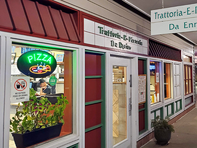 The glowing neon pizza sign in the window is like a lighthouse for hungry souls wandering the Columbia shopping center.