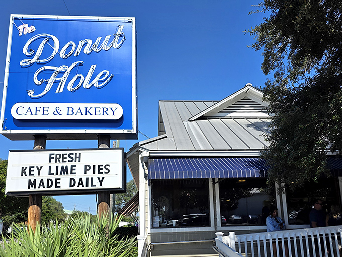 The iconic blue sign beckons like a lighthouse for hungry souls. Fresh key lime pies made daily? That's the Florida equivalent of finding buried treasure.