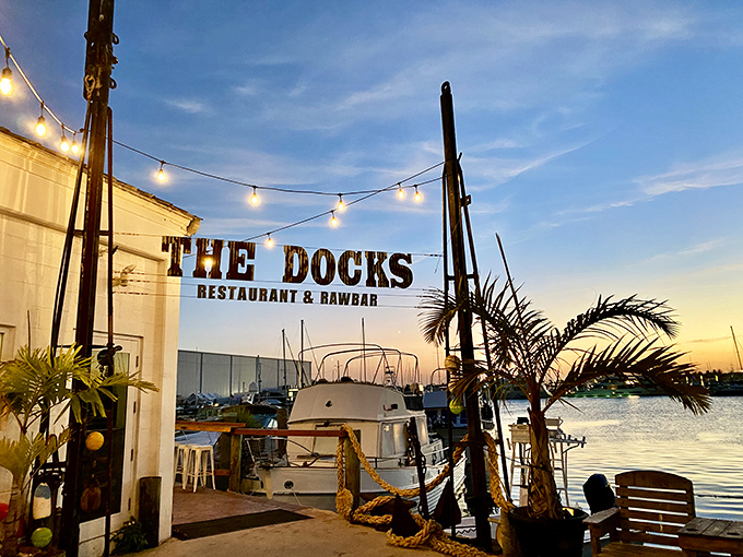 Sunset transforms The Docks into a magical realm where string lights twinkle, boats gently rock, and the day's worries dissolve into the golden horizon.