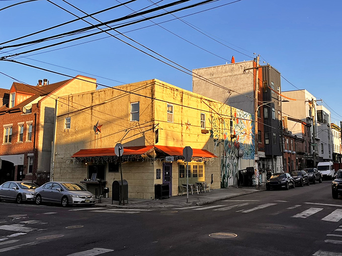 A bright yellow building with orange awnings, Honey's corner location in Northern Liberties has become a Philadelphia breakfast landmark.