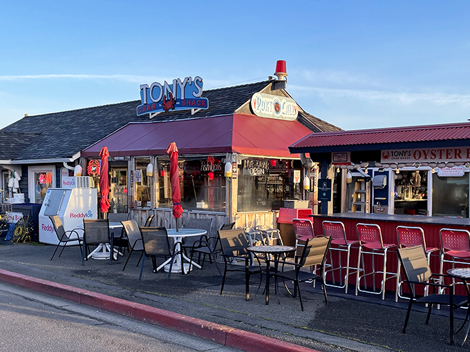 Tony's Crab Shack sits roadside like a red-roofed beacon calling hungry travelers to seafood paradise.